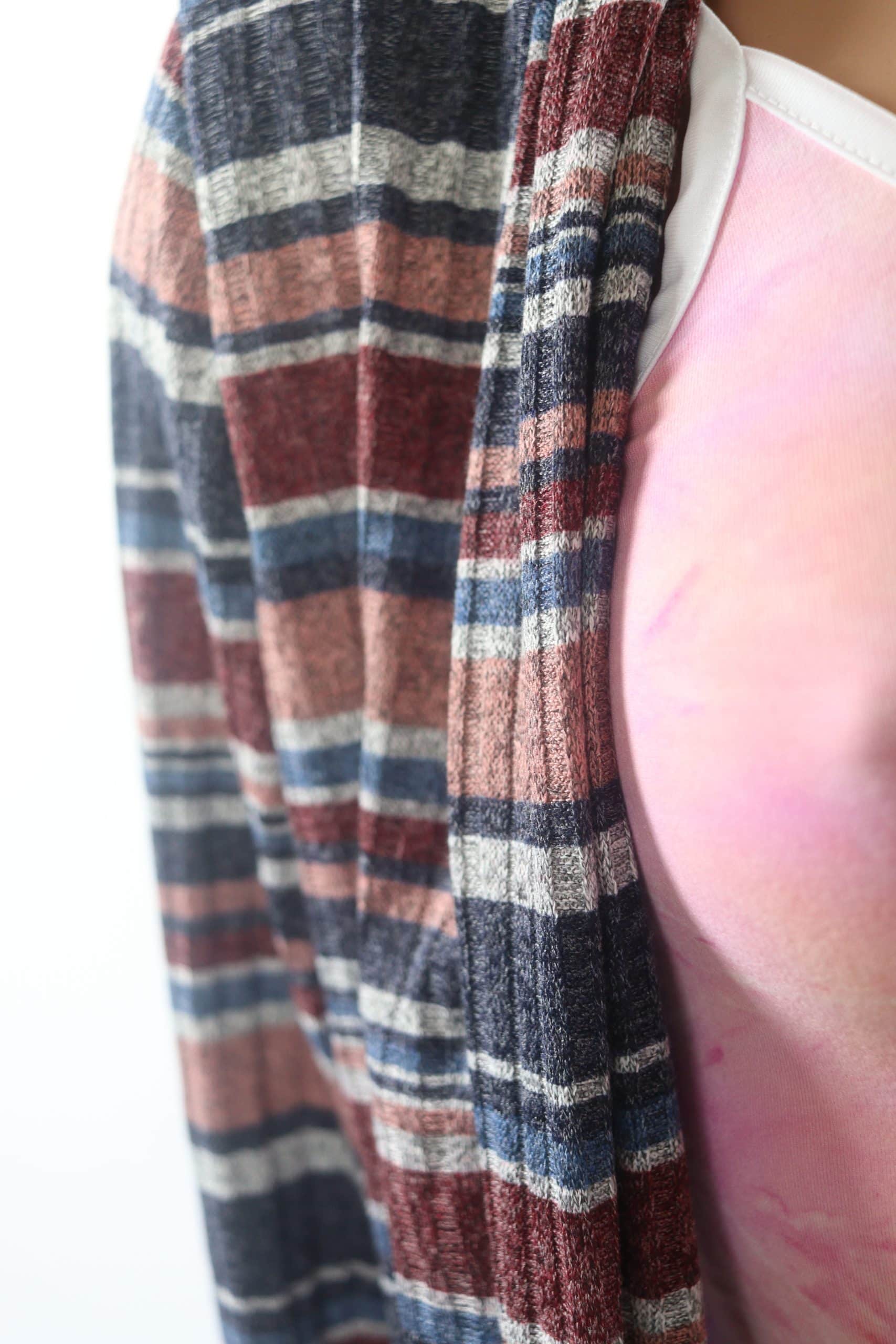 Multi Stripe Duster - Long sleeve multi color striped duster in red blue.